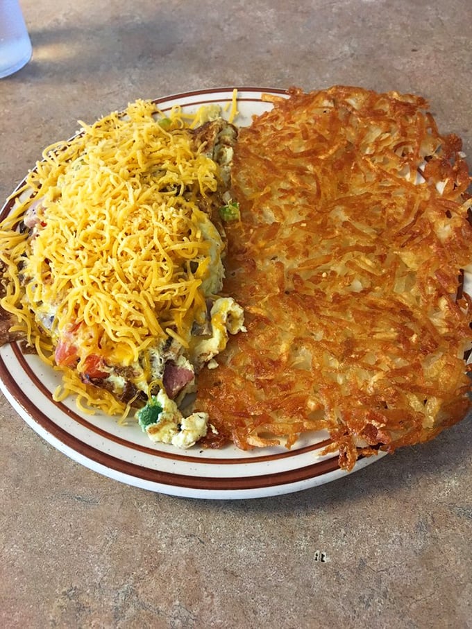 The Western omelet and hashbrowns that could end breakfast wars. That crispy potato landscape deserves its own national park designation.