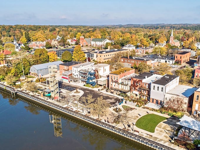 Aerial view of Allegan shows a perfect small town nestled along its riverfront. Like looking down at a Norman Rockwell painting come to life.