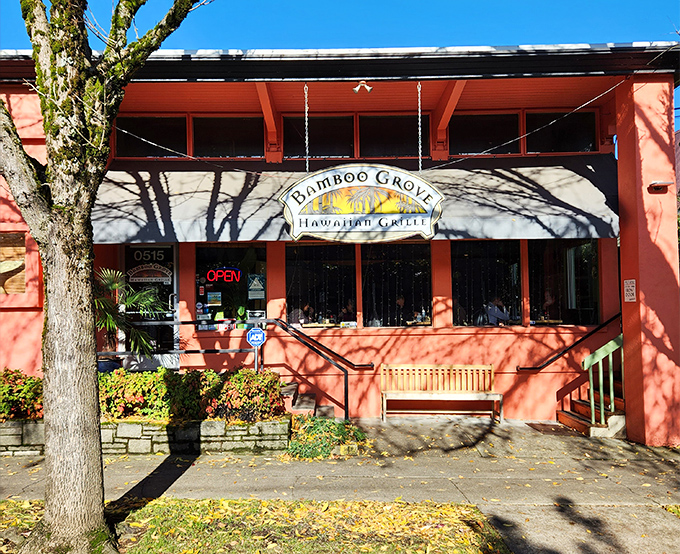 Bamboo Grove's vibrant coral exterior promises a taste of island paradise in the heart of Portland. 