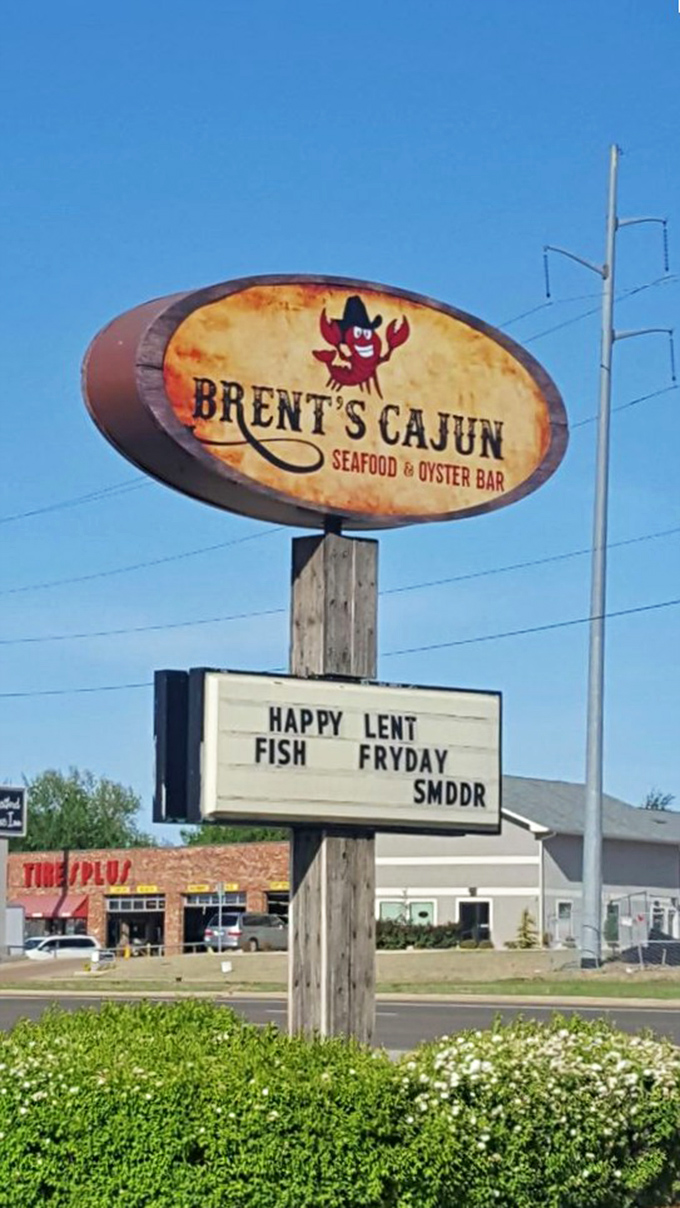 That grinning crawfish on Brent's sign isn't just cute&mdash;he knows you're about to experience some serious Cajun seafood magic!