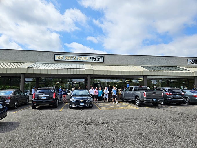 Fat Nat's storefront with line: "The line outside says everything you need to know. These eggs are worth setting your alarm for!"