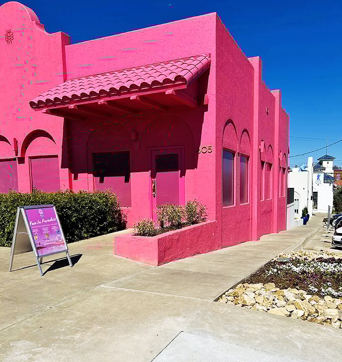 Flamingo pink never looked so inviting! This vibrant building promises tropical escape in landlocked Oklahoma.