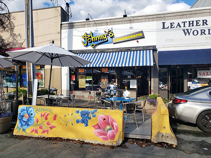 Johnny's cheerful blue awnings invite you to sit outside and pretend calories evaporate in sunshine.
