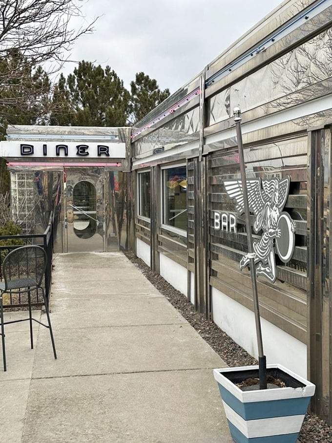 Moonlight Diner's gleaming chrome exterior looks like a spaceship that landed with one mission: delivering perfect pancakes.