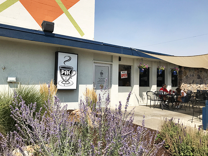 Penny Ann's Cafe's modest storefront with lavender blooms - where "heavenly hotcakes" and down-to-earth service create breakfast paradise.