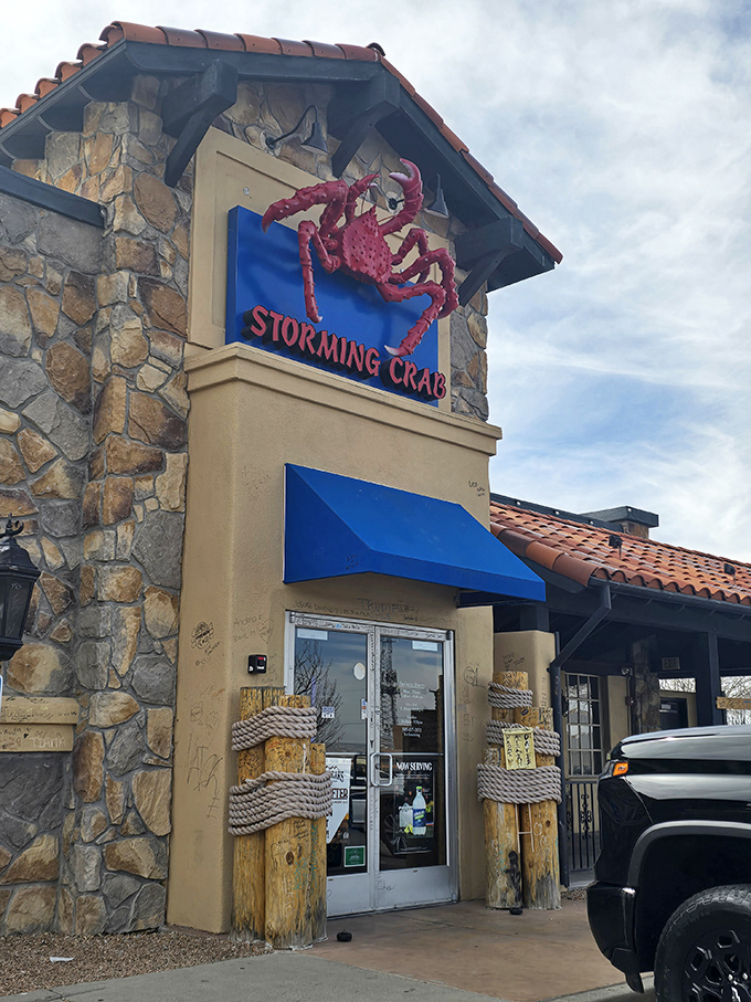 Storming Crab's giant red mascot stands guard over seafood feasts. Like finding Atlantis in Albuquerque! 