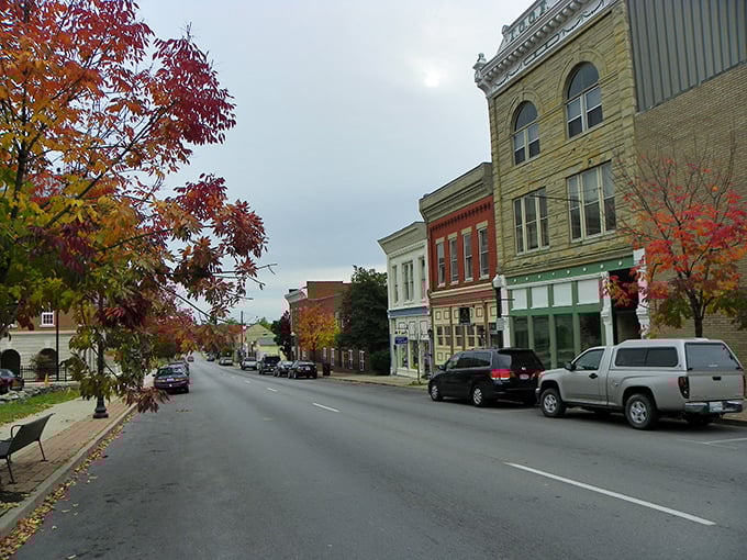 Fall foliage frames Shelbyville's main street, where your retirement budget breathes easier with every changing leaf.