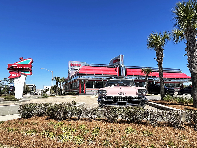 Sunliner Diner (Gulf Shores): Chrome, palm trees, and a classic car - this isn't just a meal, it's a time-traveling beach vacation!