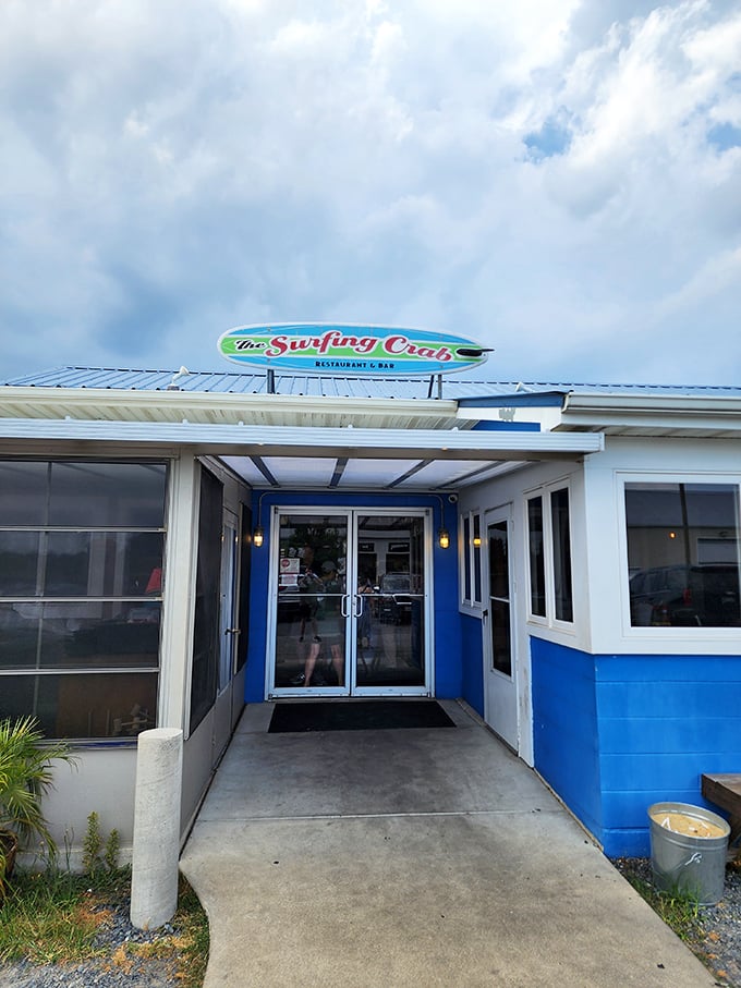 The Surfing Crab's bright blue entrance is like a portal to seafood nirvana. Grab a mallet and prepare for crab paradise!