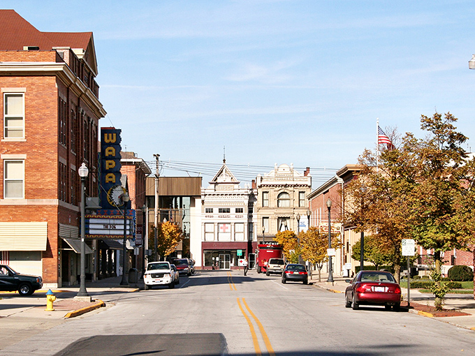 Wapakoneta's historic architecture stands proud against blue skies. These buildings have witnessed generations of local stories.