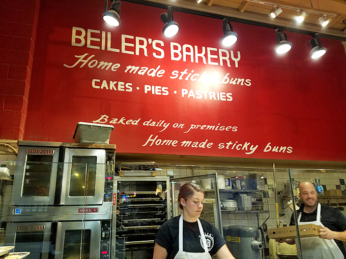 Inside Beiler's at Reading Terminal Market, where the pickle stand sign reminds you there's more to life than donuts... but not much more!