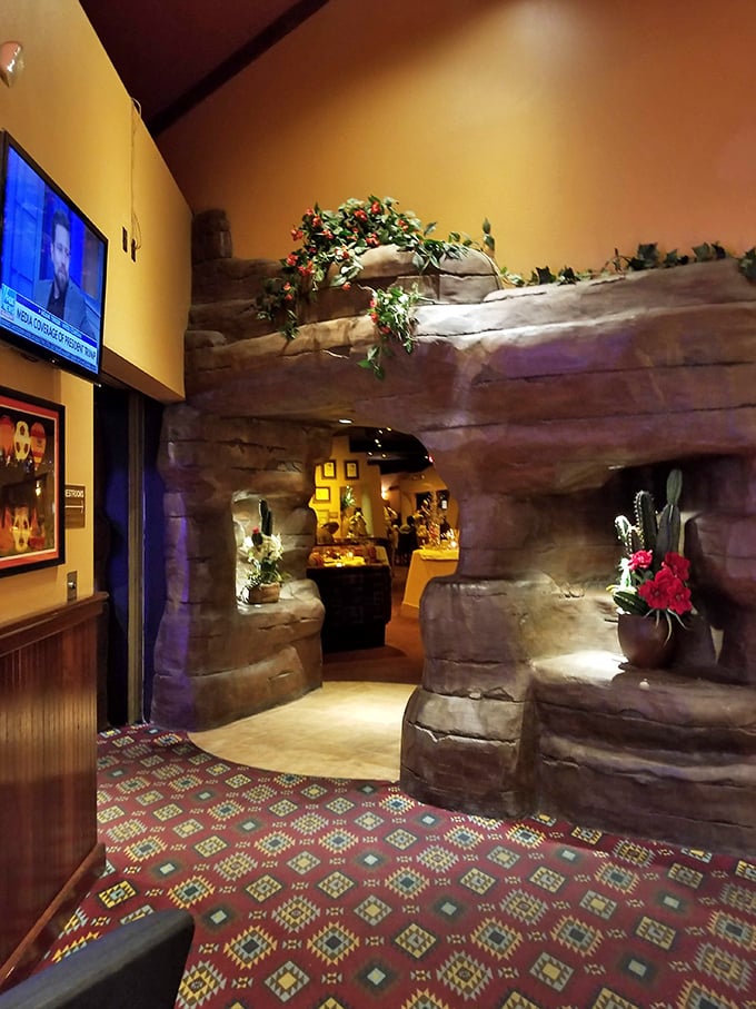 The rock formation entrance isn't just for show—it's preparing you for the geological event about to happen on your plate.