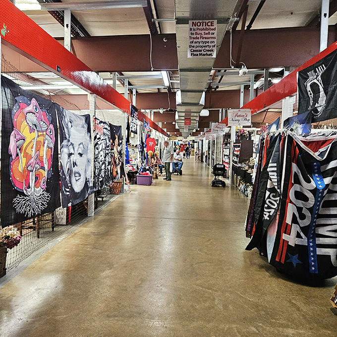 Inside Caesar Creek, wide aisles lined with colorful flags and banners create a festive atmosphere for serious bargain hunting.