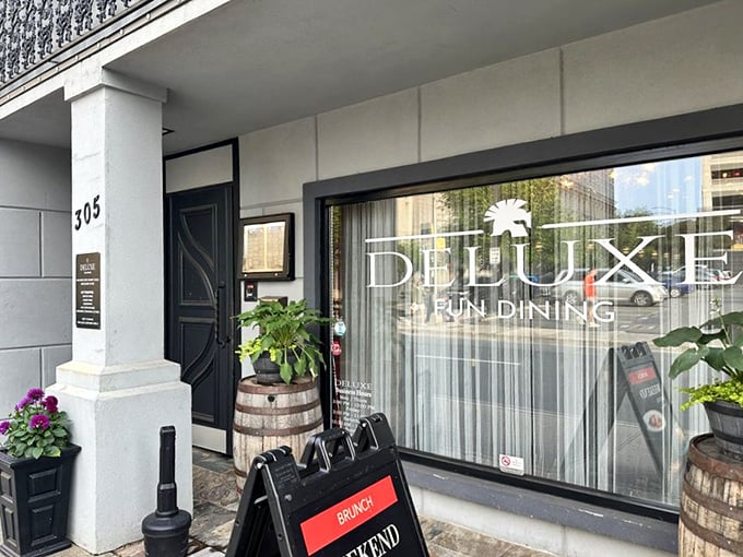 Where elegance meets entertainment. Deluxe Fun Dining's sophisticated storefront hints at the culinary adventures waiting inside.