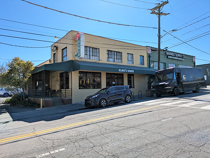 The green awning invites you into a world where breakfast rules and strangers quickly become regulars at Elmo's.