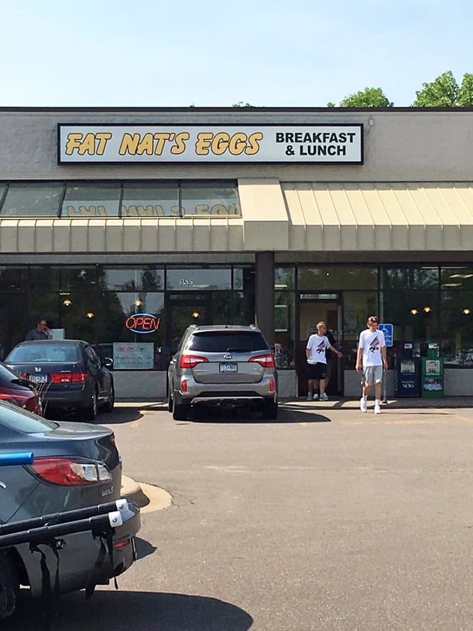 Fat Nat's entrance close-up: "No fancy frills, just breakfast thrills. Fat Nat's proves the best morning meals often hide in plain sight."
