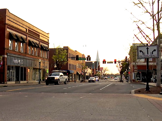 Tree-lined streets create nature's awning over Gallatin's historic downtown, where walking feels like stepping back in time.