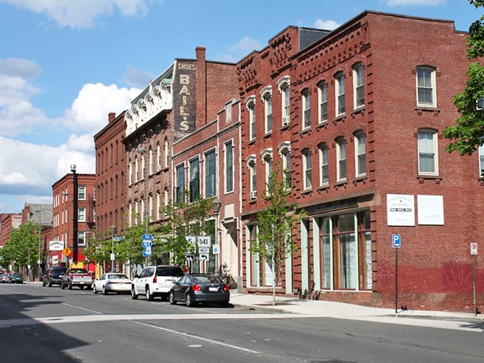 Holyoke's historic downtown showcases architectural treasures against blue skies, where past and present create a vibrant urban tapestry.