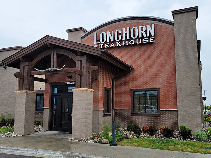 Rain or shine, that iconic Longhorn sign promises the reliable comfort of perfectly seasoned steaks that won't break the bank.