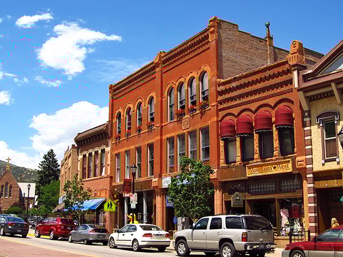 Colorful brick architecture defines the streets of Manitou Springs, where you can explore unique shops and enjoy the vibrant scenery.
