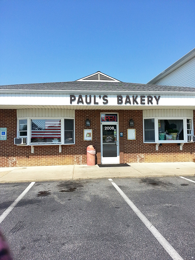 The classic American flag in Paul's window says it all&mdash;these donuts are as traditional and beloved as apple pie.