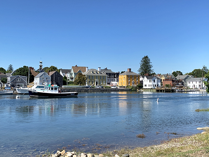 Colorful vendor tents line Portsmouth's waterfront during market days. Nothing beats fresh local goods with that ocean breeze!