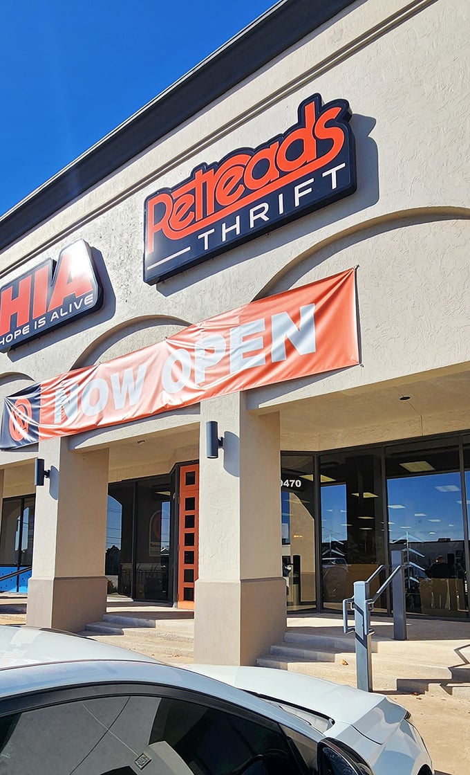 That "NOW OPEN" banner might as well say "NOW SAVING YOU MONEY" at this bright, welcoming thrift destination.