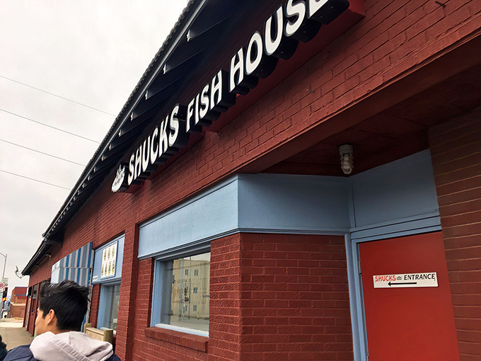 The unassuming entrance to Shucks Fish House - where seafood simplicity meets Omaha charm without any unnecessary frills.