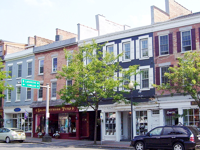 The colorful storefronts of Skaneateles stand at attention, ready to welcome visitors with small-town hospitality and lakeside views.
