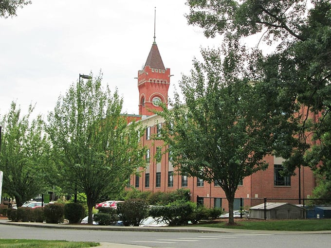 In Southbridge, your eyes will find this striking red clock tower standing tall above the lush green trees and brick buildings.