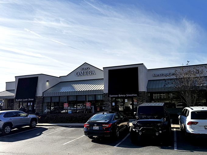 Morning light bathes Stacks Omega's exterior—a beacon of breakfast hope for hungry downtown Greenville wanderers.