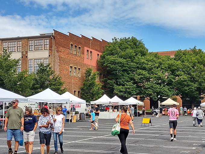 Historic brick buildings provide the perfect backdrop for this charming market where shopping feels like a small-town celebration.