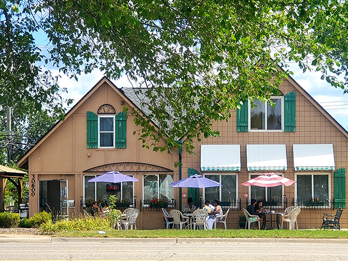 Those purple umbrellas aren't just for show &ndash; they're sheltering conversations, coffee refills, and memories being made over perfect pancakes.