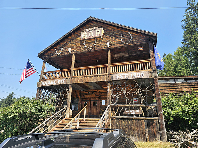 Antlers and American flags adorn The Snake Pit's frontier-style porch &ndash; a carnivore's cabin in the Idaho wilderness.