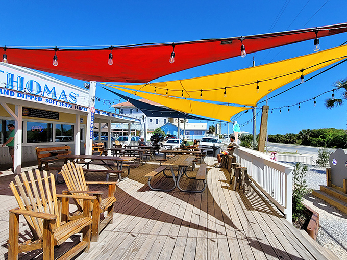 Colorful sun shades and ocean breezes make Thomas's deck the perfect spot to contemplate the meaning of donut perfection.