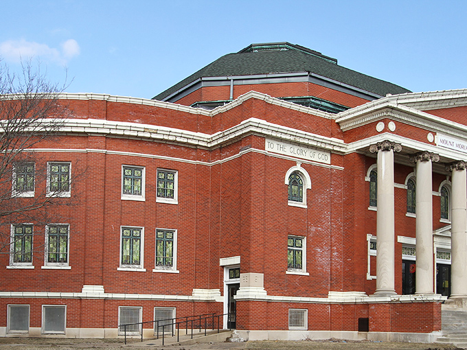Stately brick buildings house a city where living expenses behave better than well-trained golden retrievers.