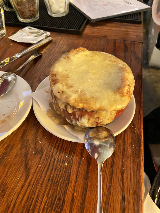 The cheese pull potential here is Olympic-worthy. This isn't just dinner; it's performance art with Gruyère as the star.