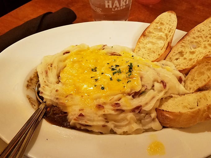 This isn't just shepherd's pie; it's edible architecture – layers of flavor built to withstand even the most determined appetite assault.