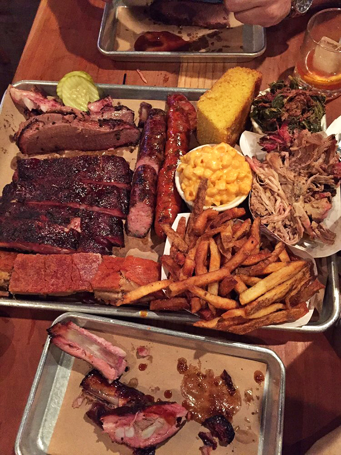 This isn't a meal; it's a carnivore's vision board. The cornbread stands guard while the meats steal the show.