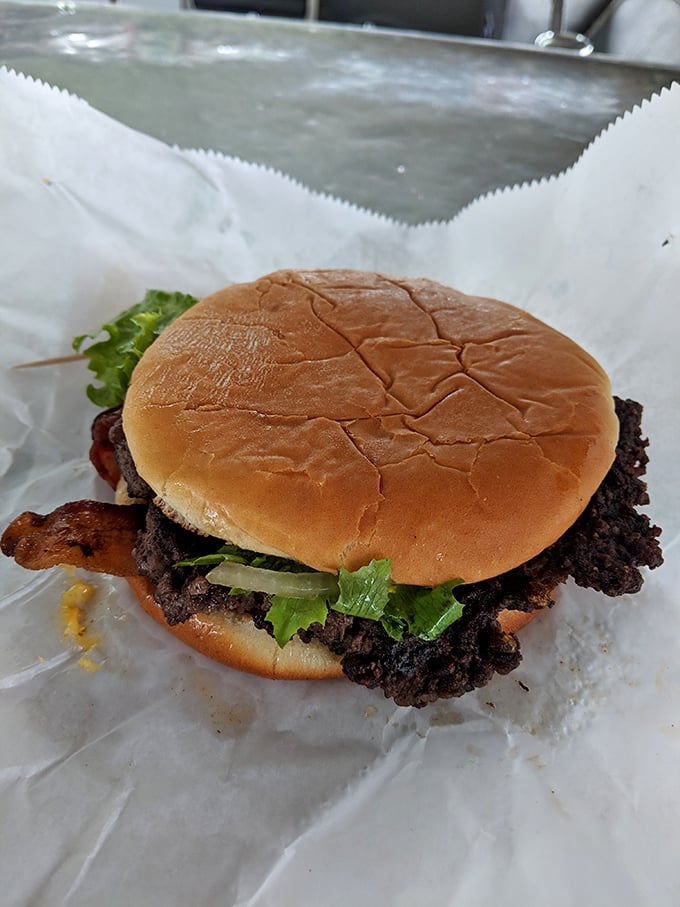 Lettuce, bacon, and a perfectly seared patty—the holy trinity of burger perfection. No filter needed when your food looks this good.
