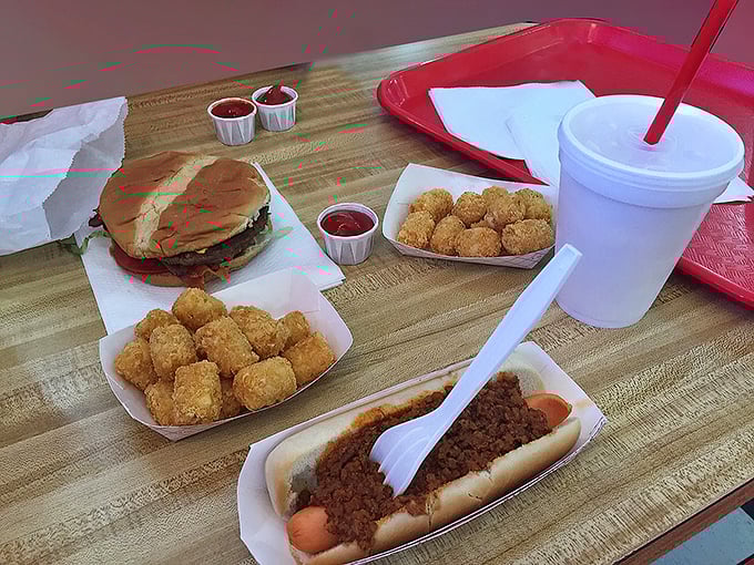 This isn't just lunch&mdash;it's edible nostalgia. A hand-formed patty, garden-fresh toppings, and an onion ring sidekick that demands equal attention.