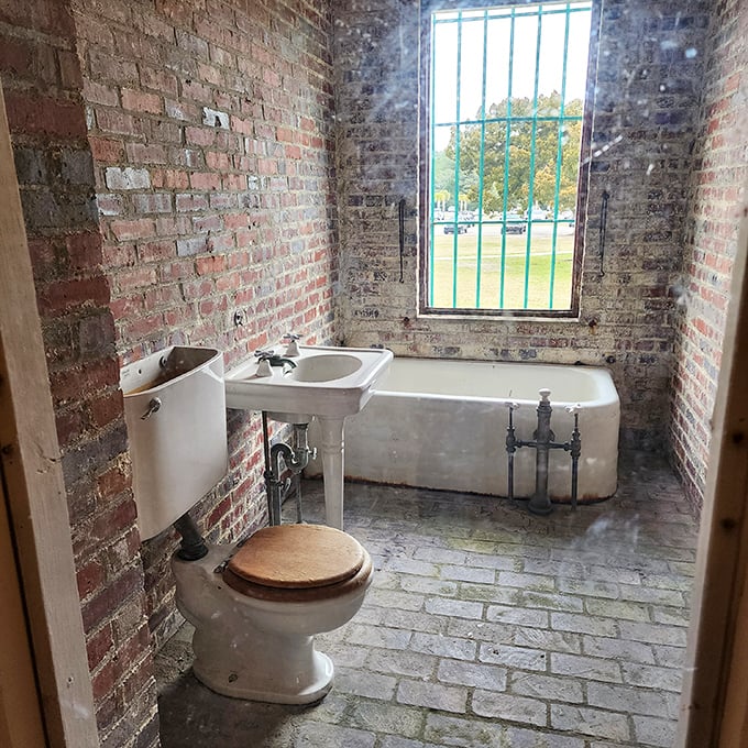 Even the bathroom at Atalaya tells a story&mdash;exposed brick, vintage fixtures, and a window that perfectly frames the coastal landscape outside.
