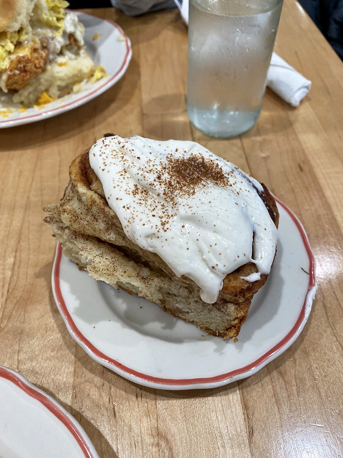 Layers of buttery biscuit dough transformed into a cinnamon-spiced masterpiece that makes waiting in line feel like a reasonable life choice.