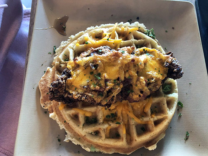 Whoever said "perfection is impossible" clearly never met this chicken and waffle. The maple syrup's slow descent is nature's most beautiful waterfall.