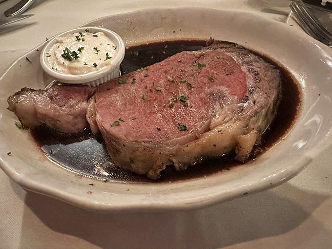 When your steak comes with its own reflecting pool of jus, you know you're dining at a place that understands the profound importance of sauce.