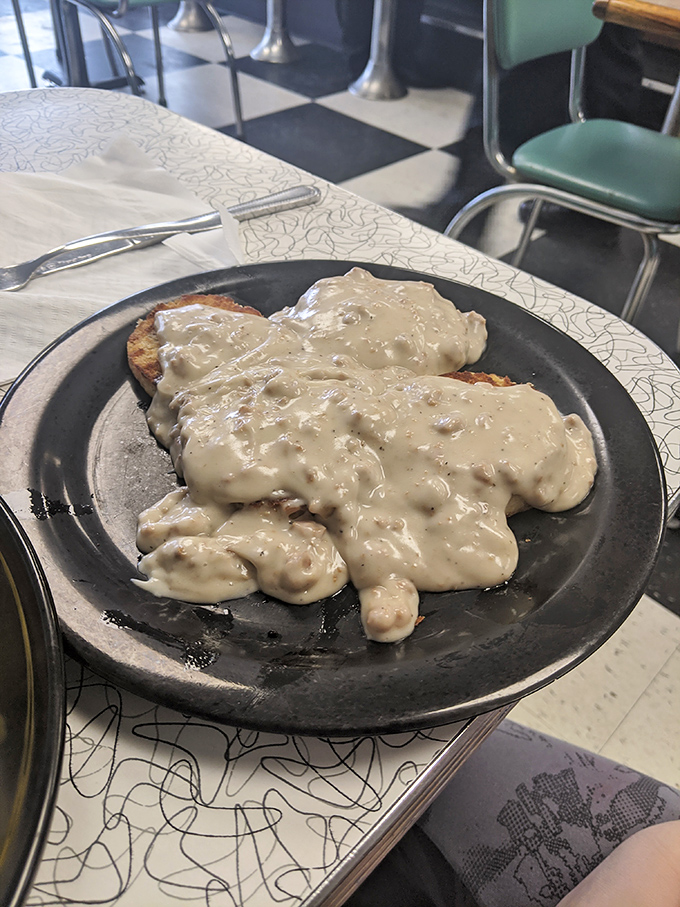 Southern comfort meets Midwest hospitality. This sausage gravy isn't just a topping &ndash; it's practically a warm, peppery blanket for those biscuits.