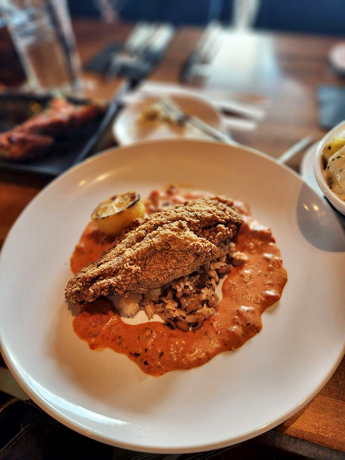 Crispy exterior, tender interior&mdash;this catfish doesn't just swim in sauce, it performs synchronized swimming routines in it.