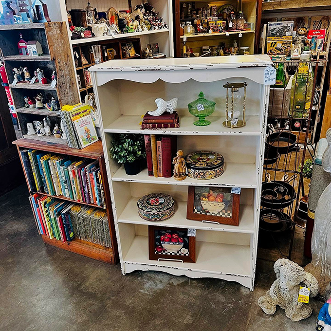 Books and collectibles that whisper stories from another era. That green candy dish probably served treats at Kennedy-era bridge parties.