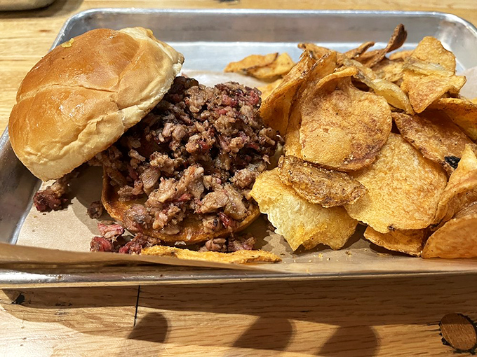 The chopped brisket sandwich: where simplicity meets perfection. Those house-made chips aren't sidekicks&mdash;they're co-stars in this lunchtime blockbuster.