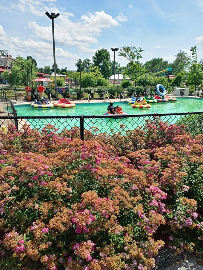 Bumper boats surrounded by vibrant flowers create a scene straight from a summer daydream. Water fights included at no extra charge!